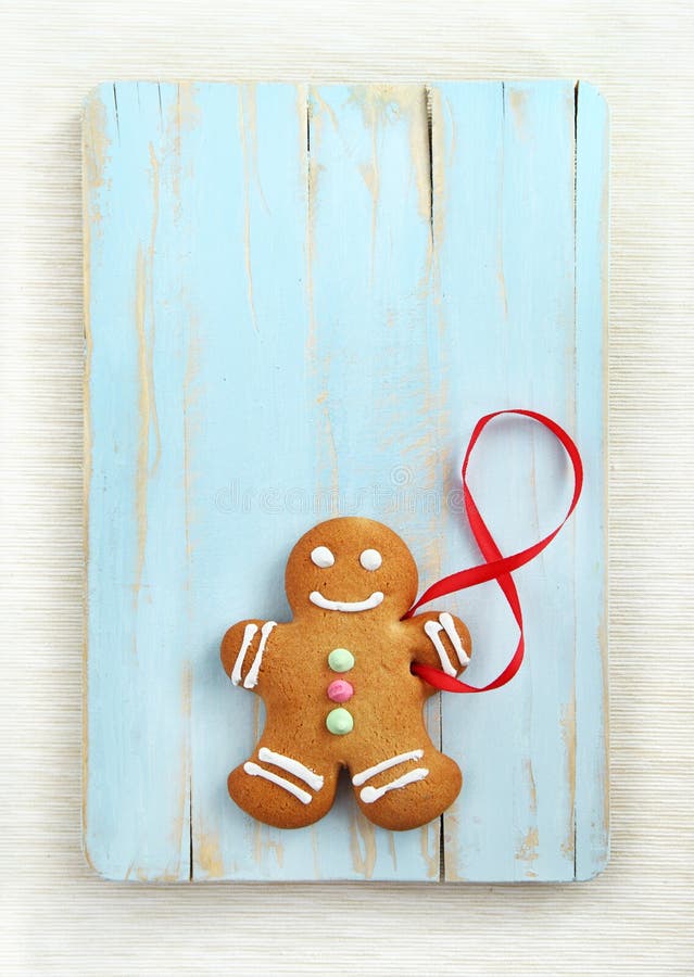 Image of Gingerbread Man on Blue Vintage Cutting Board Stock Image ...