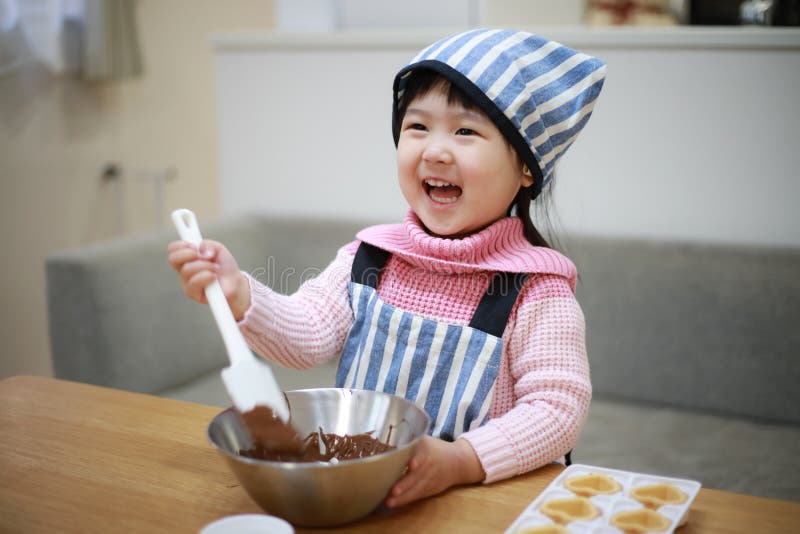 Girl making sweets stock image. Image of desserts, eating - 241905289