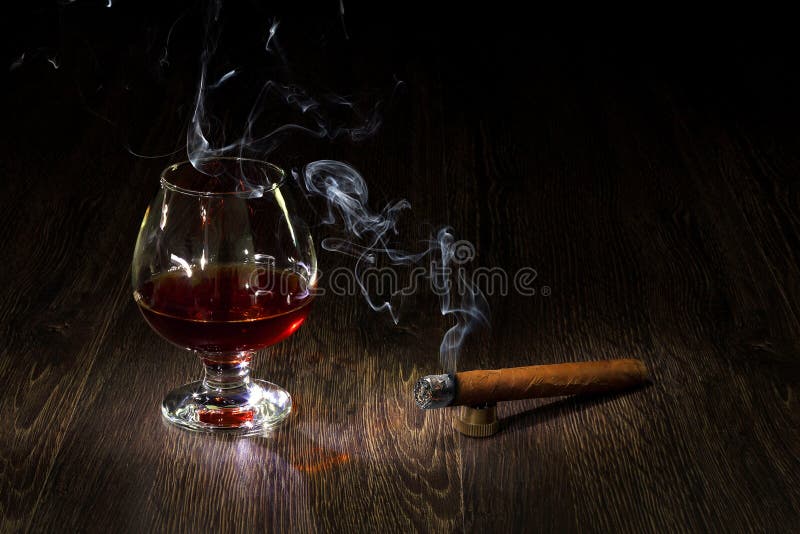 Glass of cognac and sigar stock photo. Image of beverage - 29795128