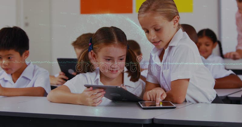 Image of Globe and Graph Over Caucasian Girls Using Tablet and Class of ...