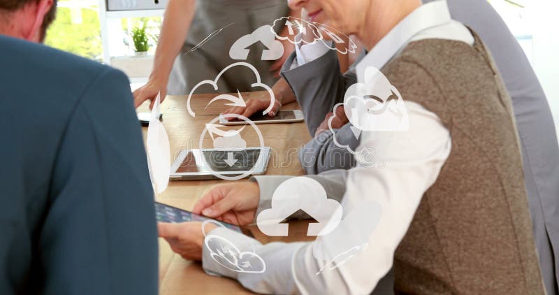 Image of Globe with Icons Over Diverse Business People Using Tablets ...