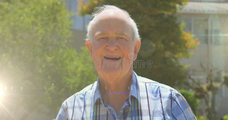Image of Glowing Lights Over Smiling Senior Man and Trees in Background ...