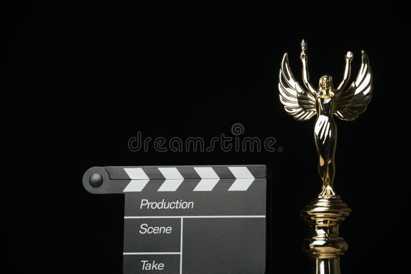 Trophy and clapper board stock image. Image of white - 22700493