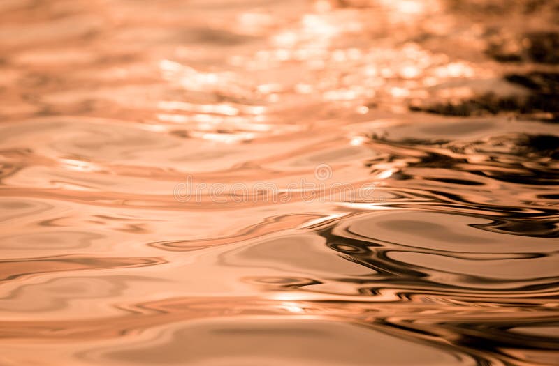A Image of Golden Ocean Waves Featuring a Water Surface in Detail Stock ...