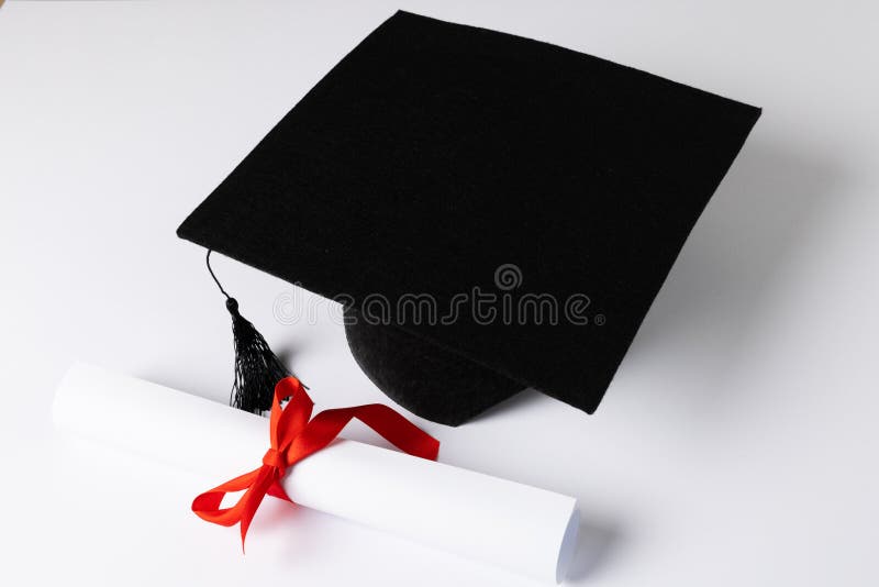 Image of Graduation Hat and Diploma on White Surface Stock Image ...
