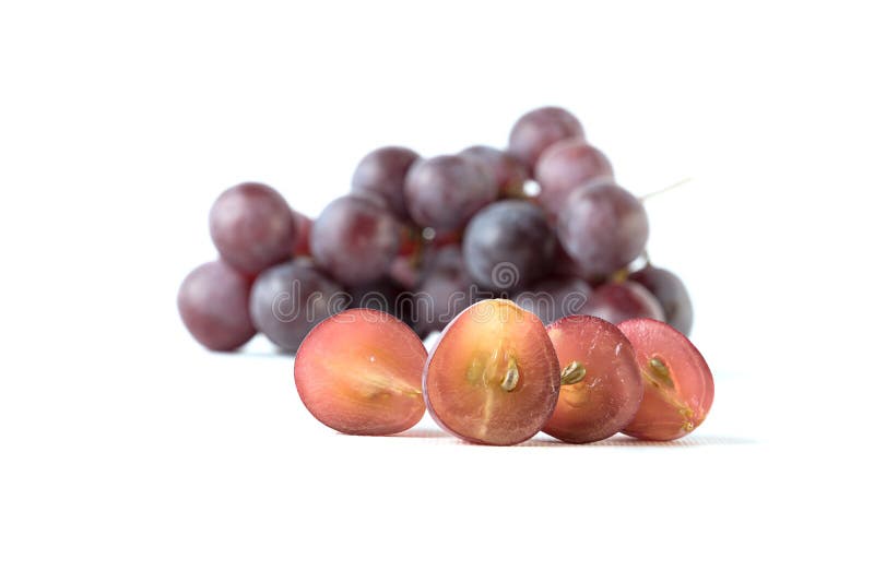 Image of Grapes Cut with a Bunch of Grapes Out of Focus, White ...