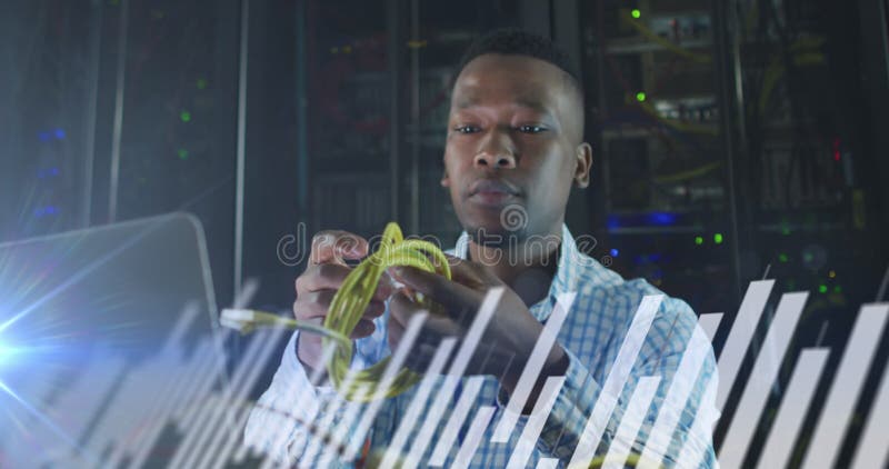 Image of Graphs Over African American Man Working on Laptop in Server Room Stock Photo - Image ...