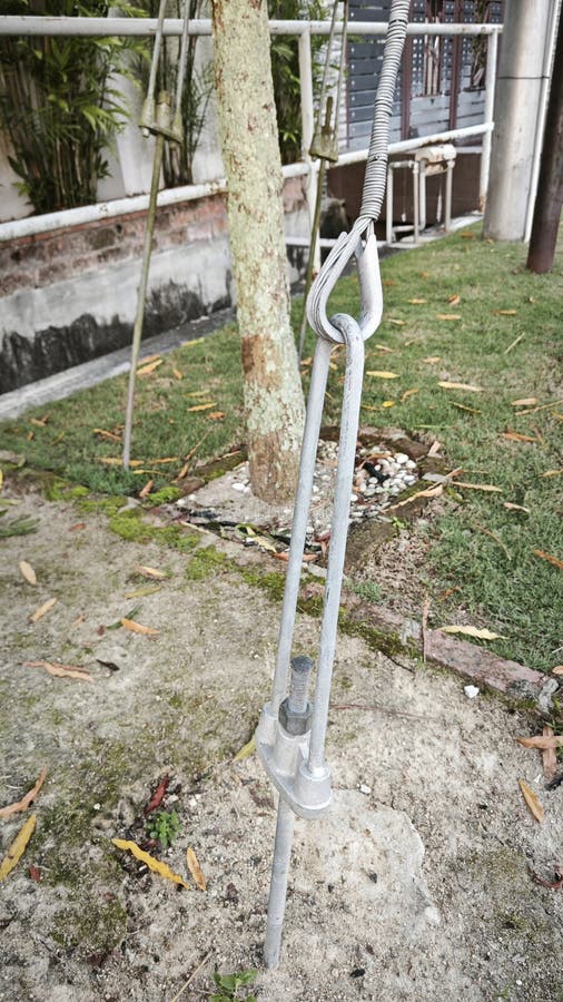 Guy Anchor Wire Balancing the Electric Pole by the Roadside. Stock ...