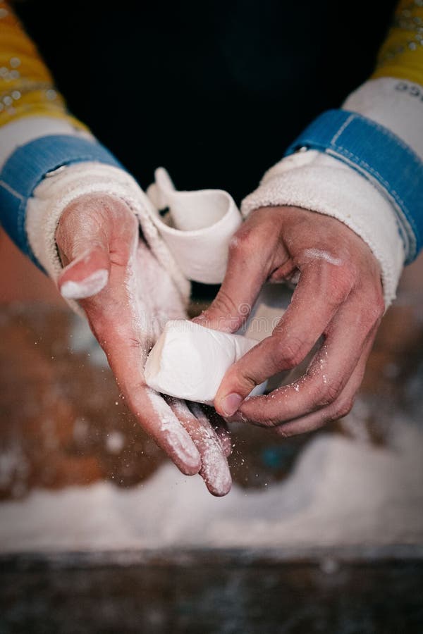 Image of a Gymnast Dusting Their Hands with Chalk before a Performance ...
