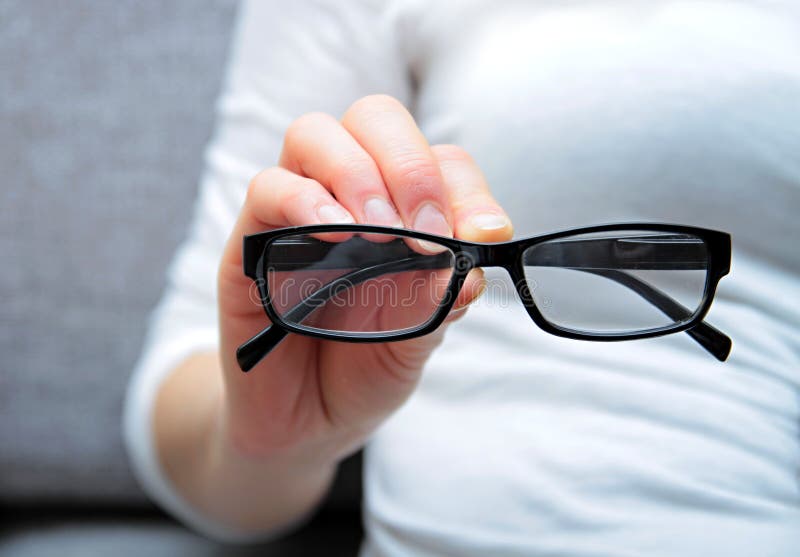 Hand holding glasses stock image. Image of fashion, instrument - 125465147