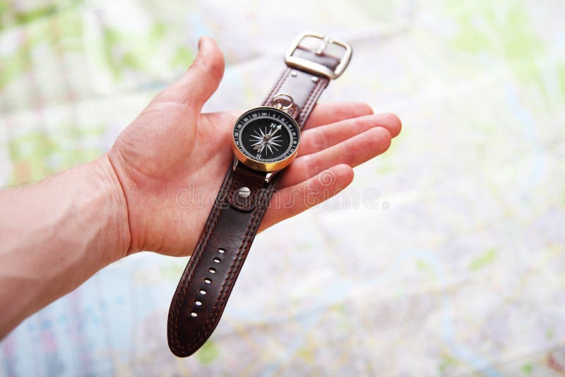 Image of Hand with Magnetic Compass Over a Map Stock Image - Image of ...