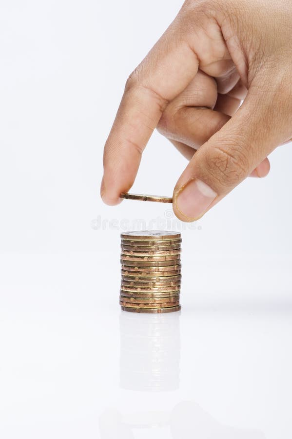 Image Of Hand Put Coins To Stack Of Coins On White Background ...