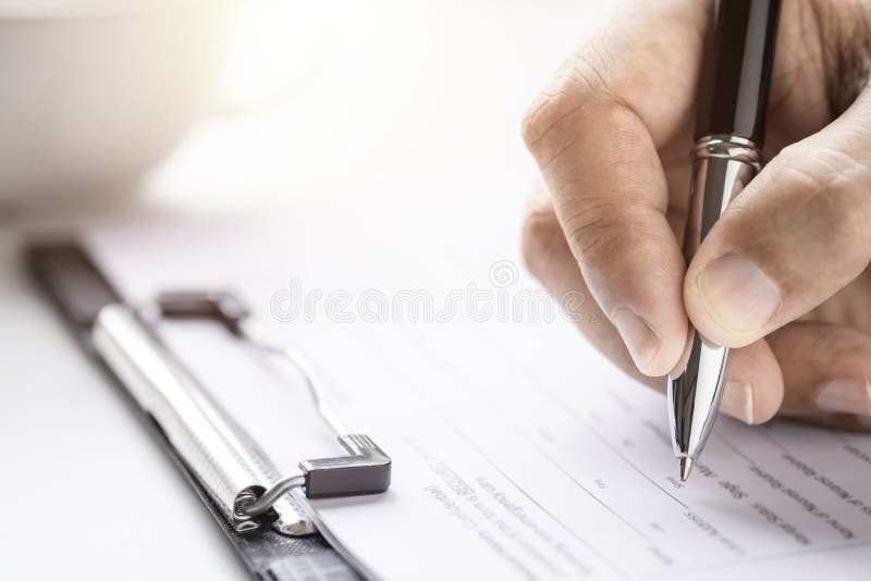 Image of Hand Using Writing Pen with Questionnaire or Paperwork Survey ...