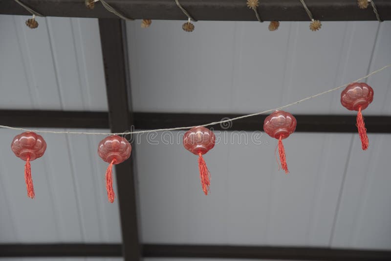 Hang on the Ceiling a Row of Decorative Red Plastic Bulbs Lantern ...