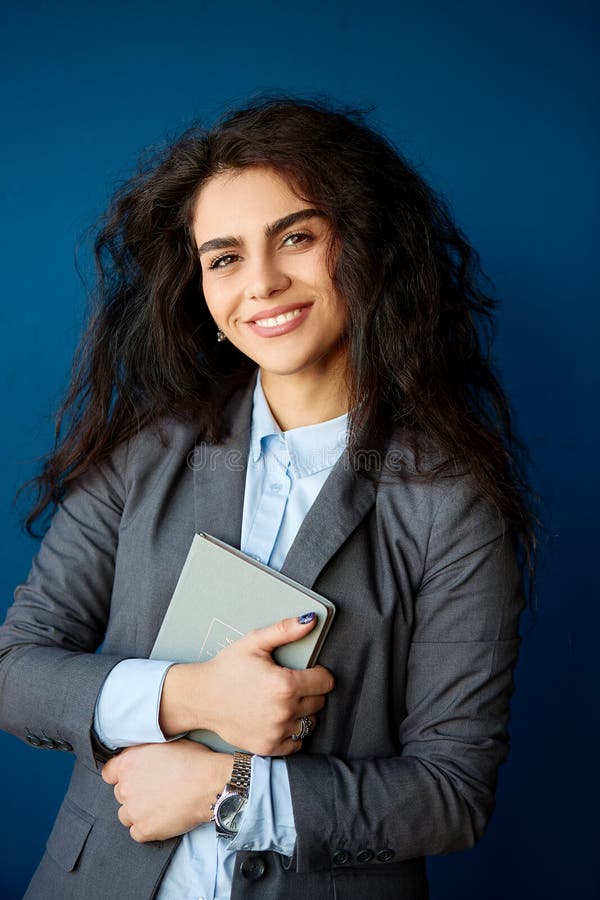 Image of Happy Young Business Woman in Office Looking Aside. Stock ...