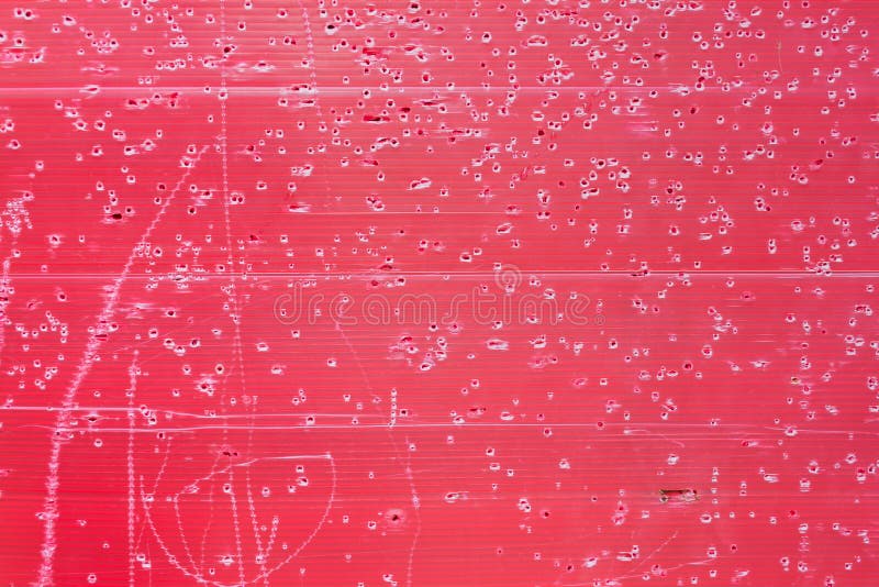 Hole on red plastic board stock photo. Image of texture - 122327246