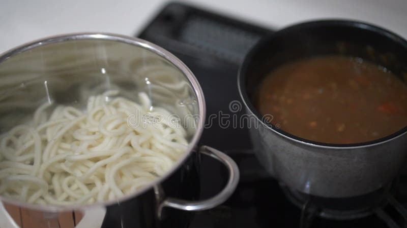 Making curry udon stock video. Video of boiling, boil - 327748379