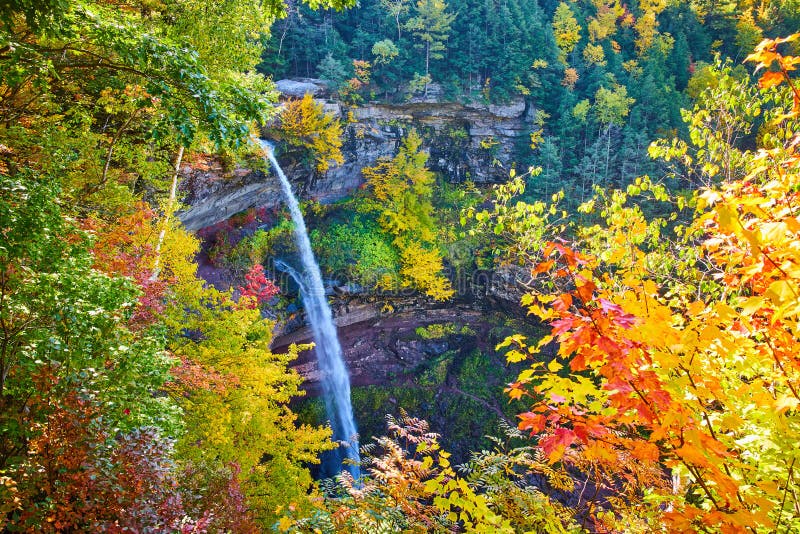 Huge Waterfall Over Cliffs Surrounded by Fall Foliage in New York Stock ...