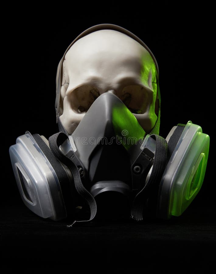 Image of Human Skull with Protective Mask on Over Black Background with ...