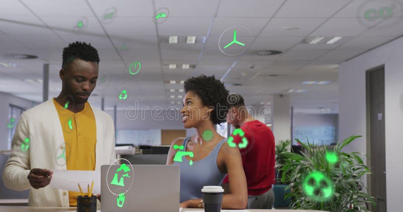 Image of Icons Over Diverse Business People Using Laptop and Discussing ...