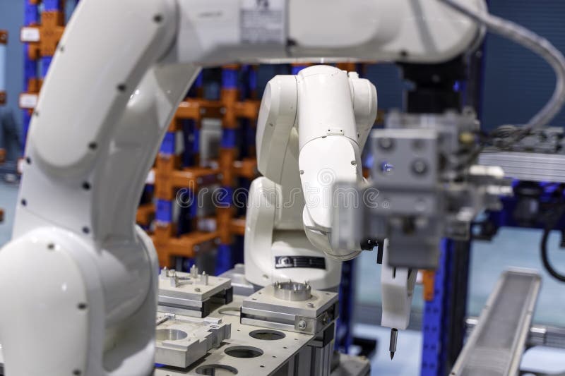 Image of Industrial Robotic Working Creates Aluminum Engine Components ...