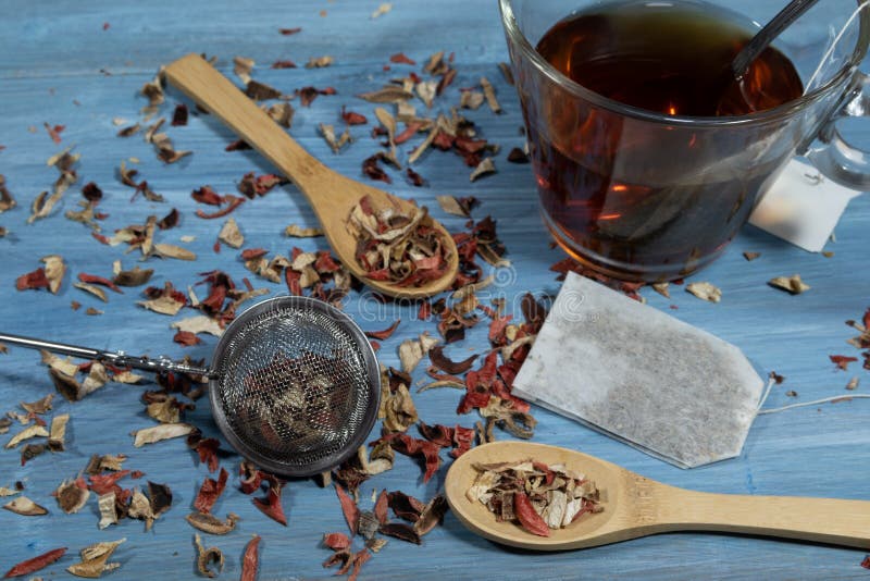 Image of Infusion Leaves, Wooden Spoon and Cup of Tea Stock Photo ...
