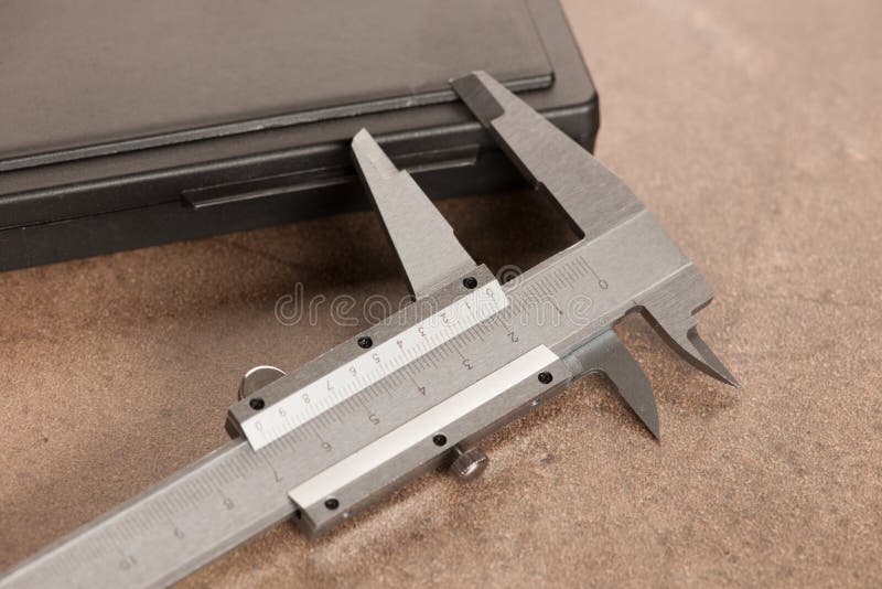 Image of Calipers and Micrometers on the Wall. Instruments for Accurate ...