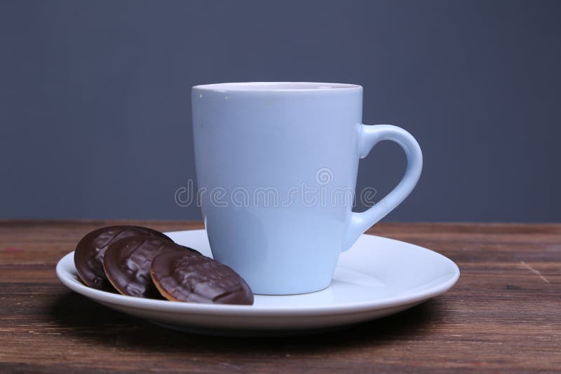 Image of Ivory Tea Cup with Sweet Heart Shaped Cookie Stock Image ...
