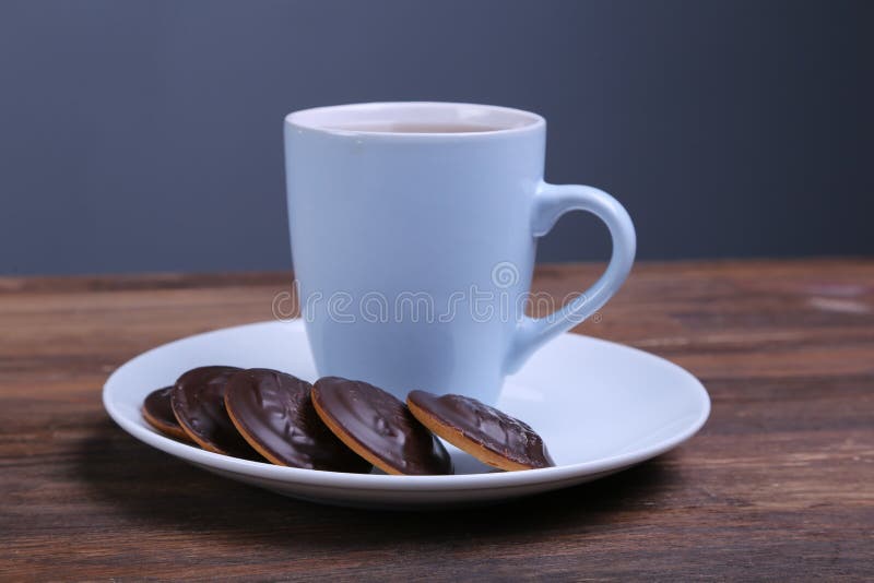 Image of Ivory Tea Cup with Sweet Heart Shaped Cookie Stock Photo ...