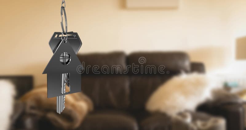 Image of Key with Keychain in Shape of House Over Living Room Interior ...