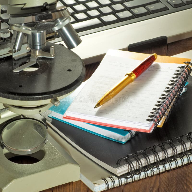 Image of Keyboard ,microscope, Notebook and Pen Closeup Stock Image ...