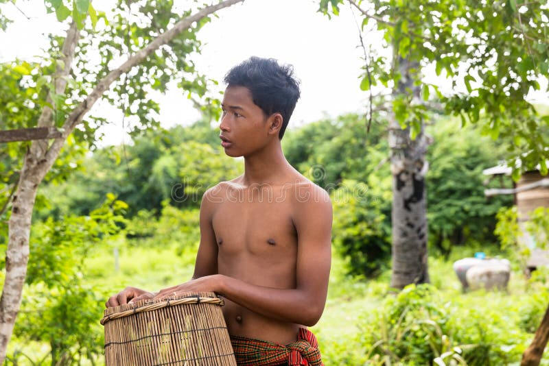 Image of a Khmer Rural Young Man in the Countryside. Fresh Frog/toad ...