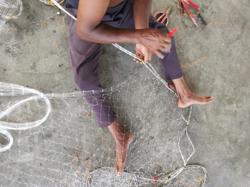 Knitting Fishing Net and Tool on the Ground. Stock Image - Image of ...