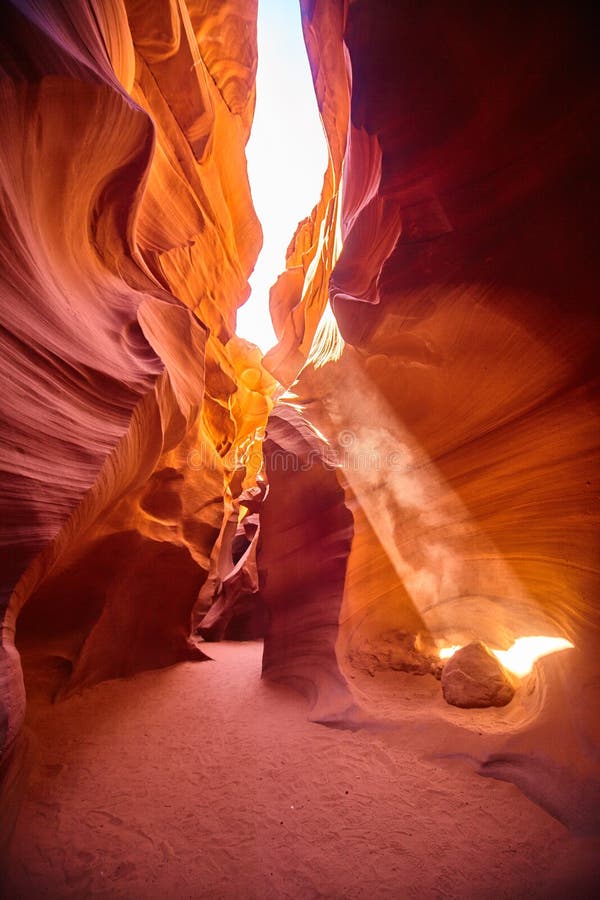 Light Filters in at an Angle through an Orange Canyon Stock Image ...
