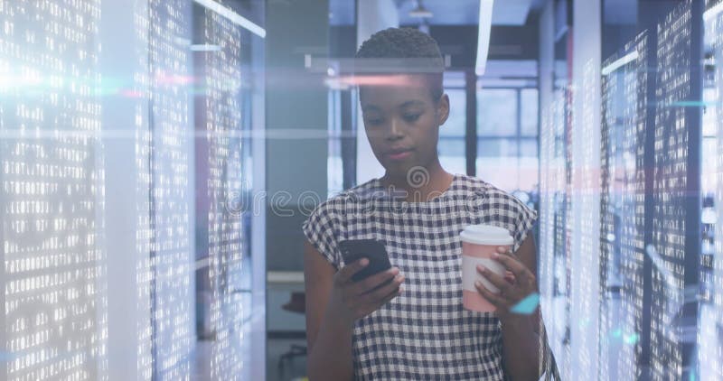 Image of Lights Over African American Women in Server Room Stock Photo ...