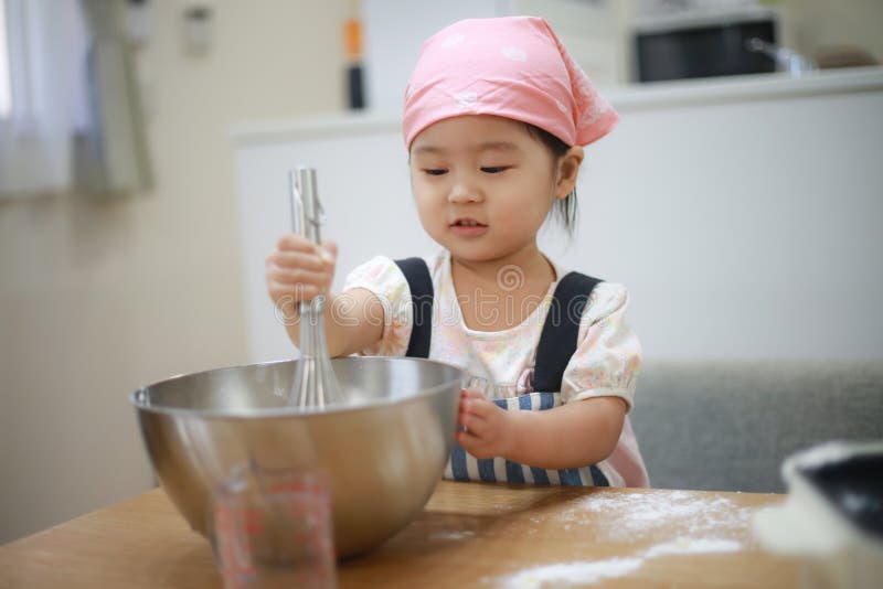 Image of a girl cooking stock photo. Image of toddlers - 238421128