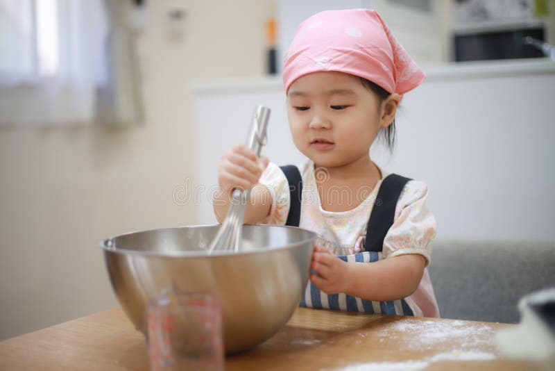 Image of a girl cooking stock image. Image of helping - 238421131