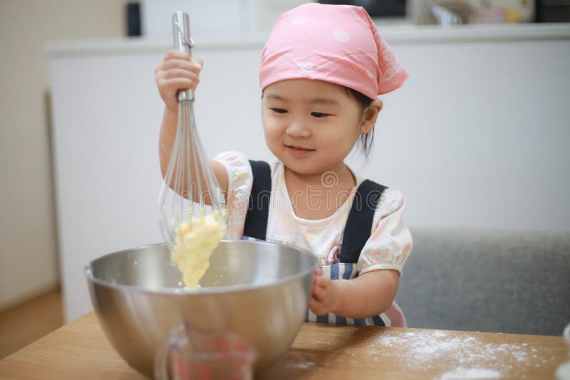 Image of a girl cooking stock image. Image of helping - 238421133