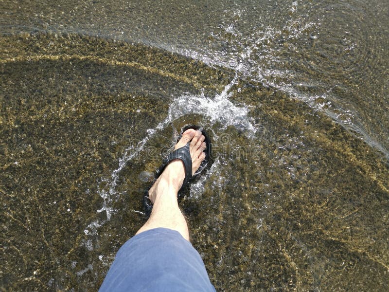 Look Down View of Foot Stepping Onto the Puddle Stock Photo - Image of ...