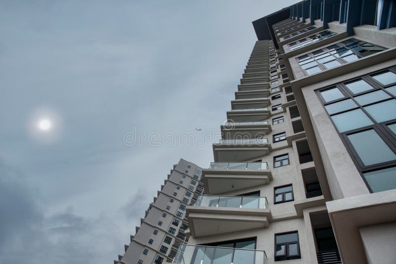 Looking Up the High Rise Urban Building with an Airplane Flying Over ...