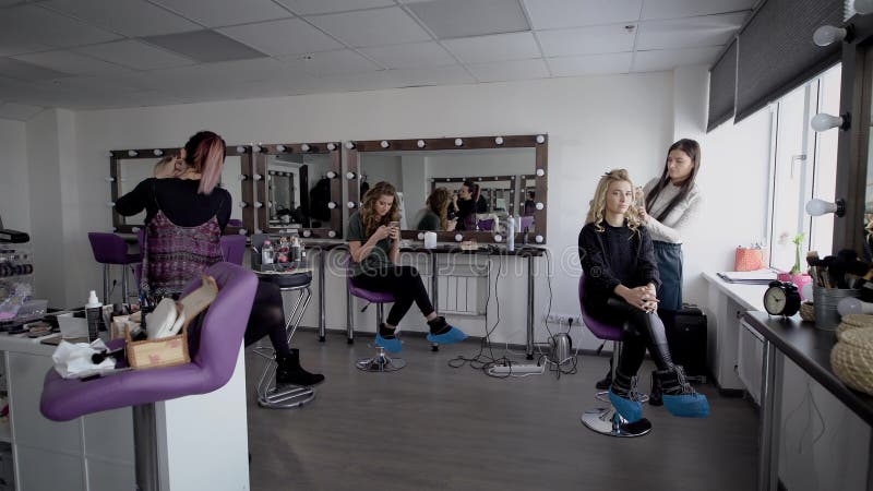 Image of Luxury Beauty Parlour. Three Models are Sitting in the Hall ...