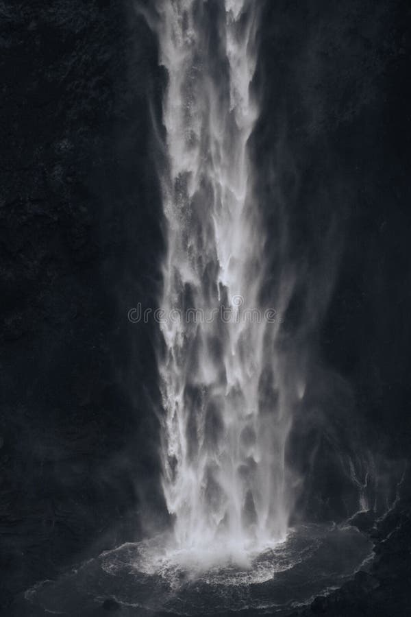 Image of a Majestic Waterfall Cascading Down a Rocky Cliff Face Stock ...
