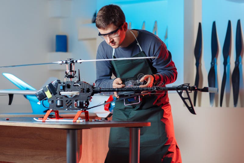 Image of Male Engineer or Technician with Remote Control in His Hands ...