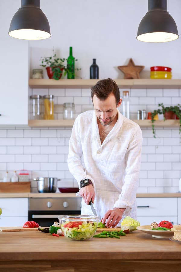 Image of Man Cooking Dinner on Table Stock Image - Image of family ...