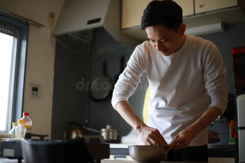 Image of a man cooking stock image. Image of bright - 241690841