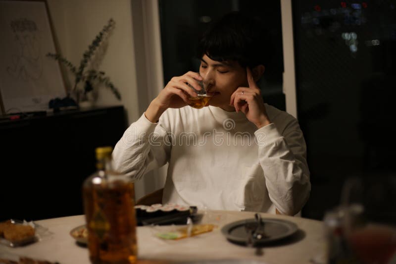 Man eating at home stock photo. Image of room, life - 325182416