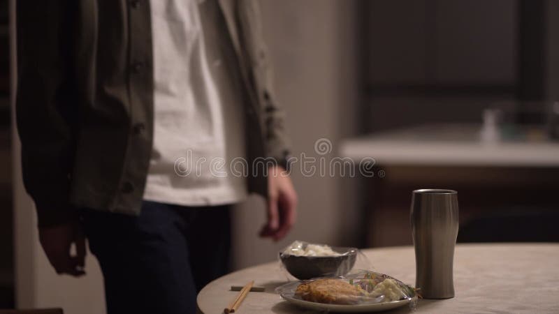 Man eating at home stock video. Video of warm, person - 325183369