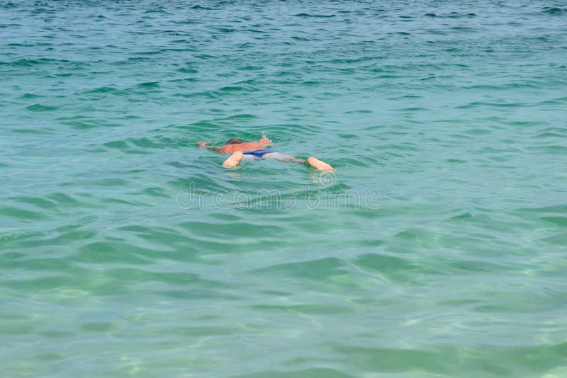 Man lying on the water stock image. Image of blond, water - 57500873