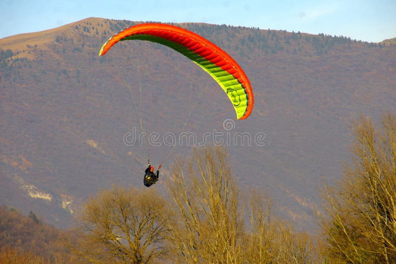Image of Man Practicing Parachuting Over Mountain Landscape Stock Image ...