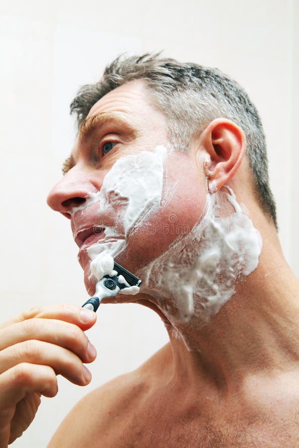 Man Shaving Face with Razor Stock Photo - Image of person, clean: 111105960
